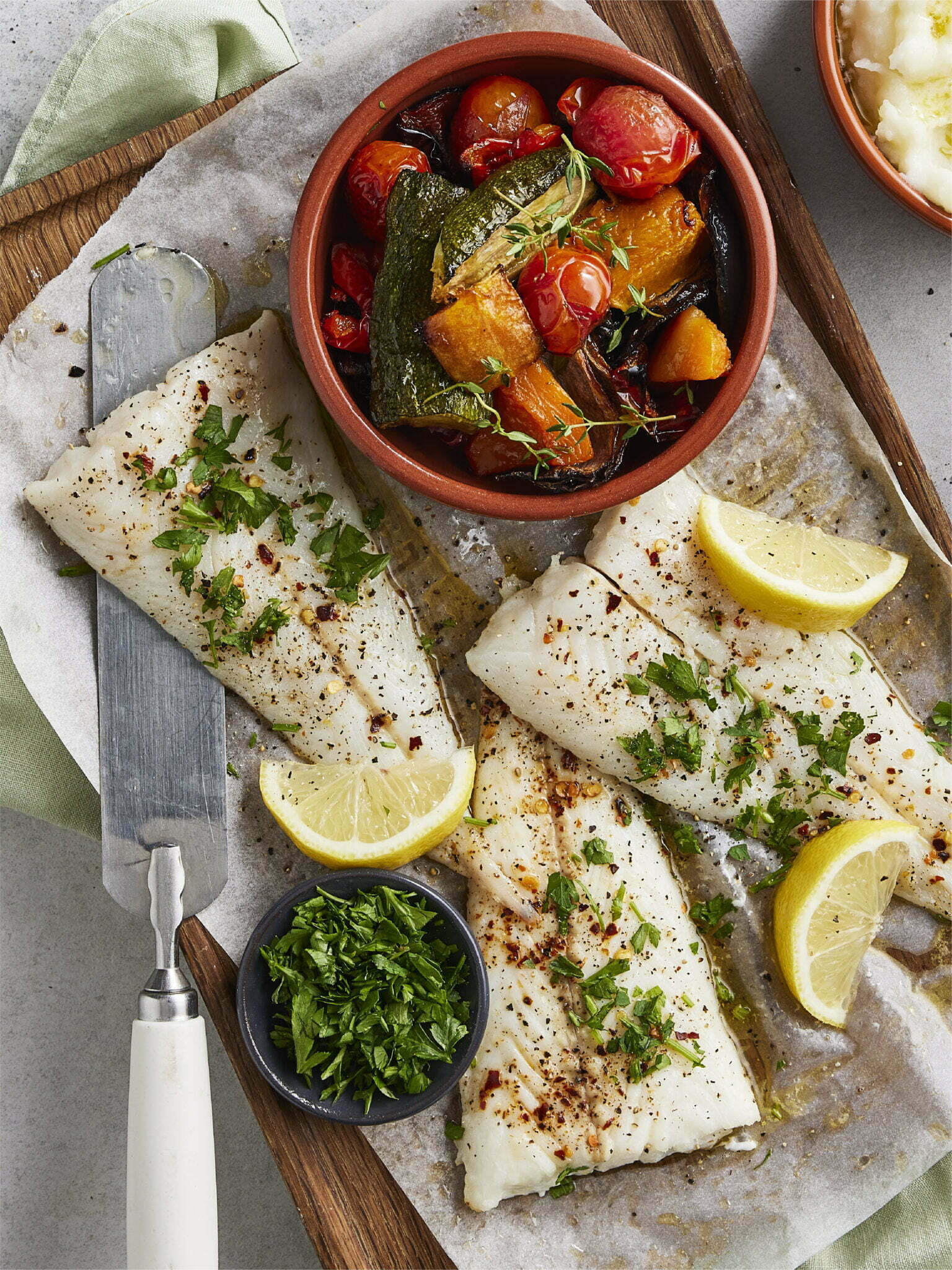 GRILLED HAKE FILLETS WITHLEMON BUTTER, MASH & ROAST VEGETABLES - I&J